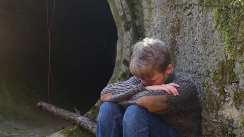 Sad little child hiding from people in a... | Stock Video | Pond5