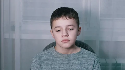 Sad Lonely Guilty Child Sitting Alone in... | Stock Video | Pond5