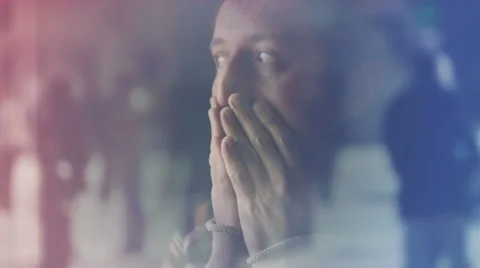 Sad man standing by the window of his li... | Stock Video | Pond5