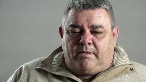 sad portrait of a depressed fat man sitt... | Stock Video | Pond5