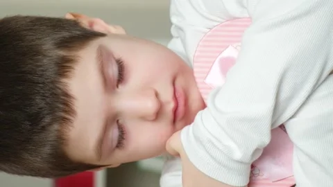 A sad preschool little boy holds tightly... | Stock Video | Pond5