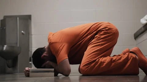 A sad prison inmate, man in prison weari... | Stock Video | Pond5