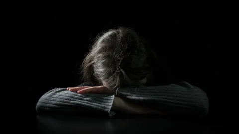 Sad teen face sit on black background. | Stock Video | Pond5