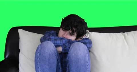 Sad teenage boy with green screen backgr... | Stock Video | Pond5