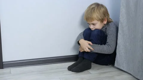 Child Crying In Corner