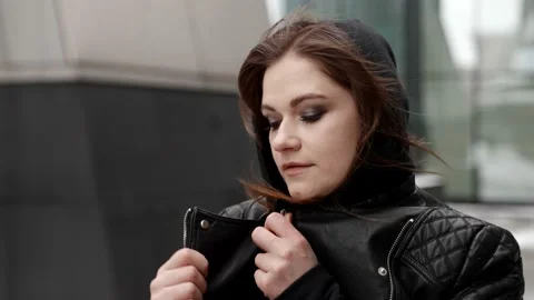 sad woman on city street at cold winter ... | Stock Video | Pond5