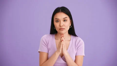 Sad woman clapping hands at camera | Stock Video | Pond5