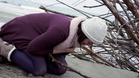 Sad woman crying in front of ocean slow ... | Stock Video | Pond5