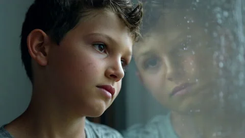 Sad Boy Looking Out Window Stock Footage ~ Royalty Free Stock Videos ...