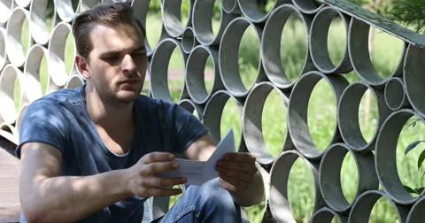 Sad Young Boy Reading Letter Unhappy Man... | Stock Video | Pond5