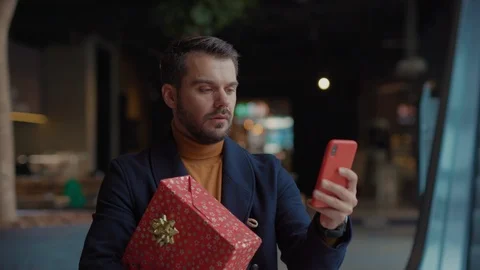 Sad young man in shopping mall with Chri... | Stock Video | Pond5