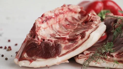 Saddle of mutton - raw red meat - with v... | Stock Video | Pond5