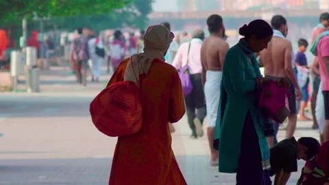 Sadhu monk wearing the saffron robes hol... | Stock Video | Pond5