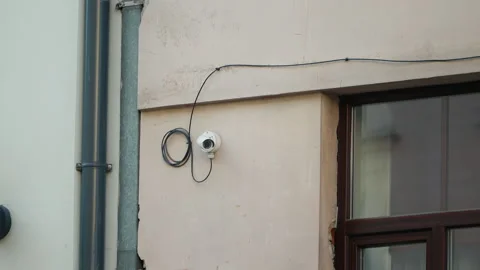 Safety First: CCTV Camera on Building Wa... | Stock Video | Pond5