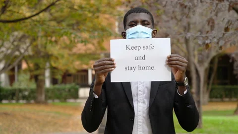 safety, precaution -black man with mask ... | Stock Video | Pond5
