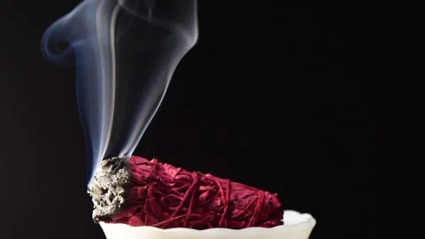 Sage smoke close up black background | Stock Video | Pond5