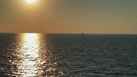 Sail boat sailing far away in open sea a... | Stock Video | Pond5