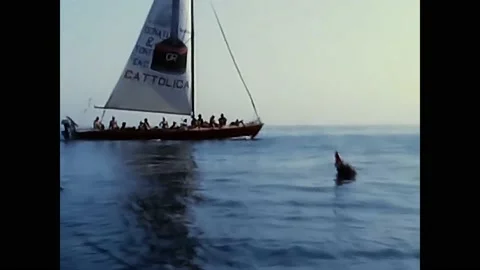 sailing boat with people at sea 70s | Stock Video | Pond5