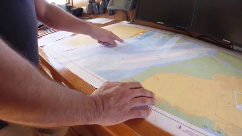 sailor reading nautical chart map ship b... | Stock Video | Pond5