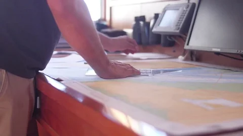 sailor reading nautical chart map ship b... | Stock Video | Pond5