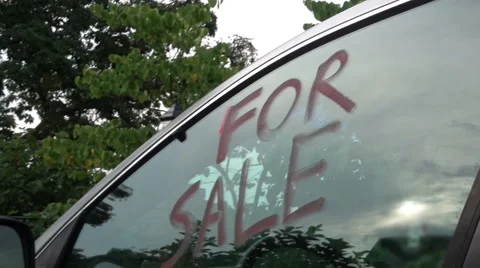 for sale writing on glass car window | Stock Video | Pond5