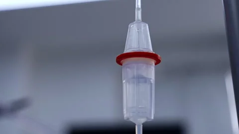 Saline solution dripping inside the drop... | Stock Video | Pond5