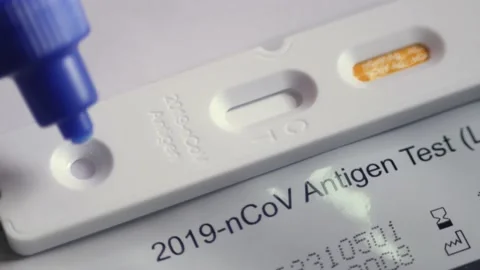 Saliva being dropped in an Antigen test ... | Stock Video | Pond5