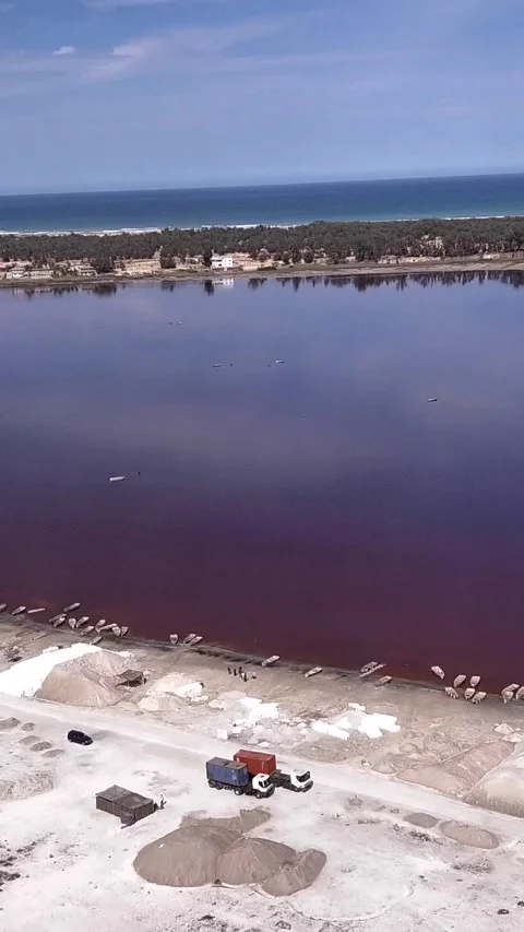 Salt piles and dirt road over salt along... | Stock Video | Pond5