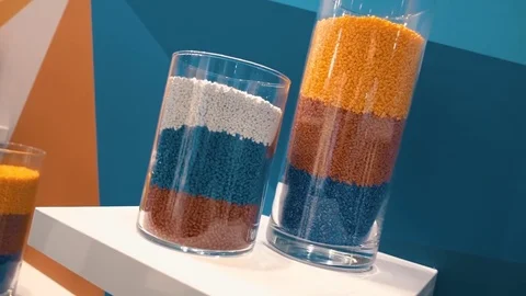 Samples of multi-colored plastic pellets... | Stock Video | Pond5