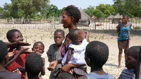 San people including children are arguin... | Stock Video | Pond5