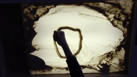 Sand animation. Child drawing sand on a ... | Stock Video | Pond5