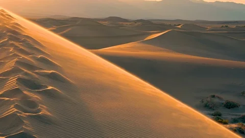 Sand Dunes blowing by wind on the top of... | Stock Video | Pond5