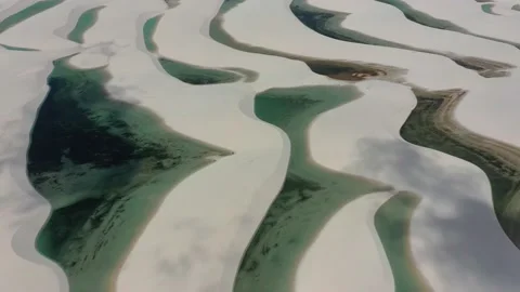 Sand dunes mountains and rain water lago... | Stock Video | Pond5