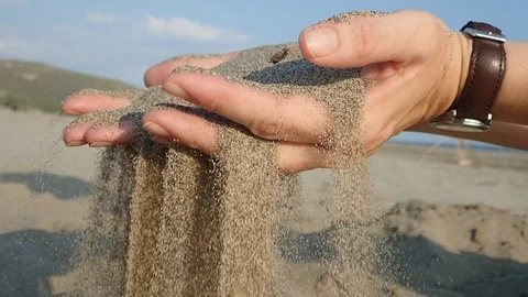 Sand Falling From Hand Stock Video Footage | Royalty Free Sand Falling ...