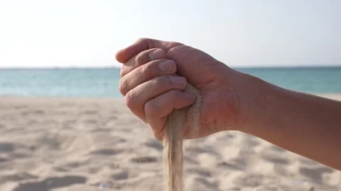 Sand Falling From Hand Stock Video Footage | Royalty Free Sand Falling ...