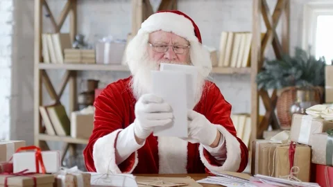 Santa Checking Christmas Mail in His Off... | Stock Video | Pond5