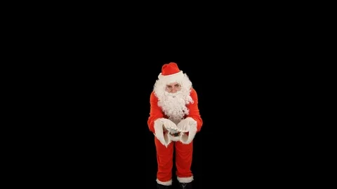 Santa Claus blowing magic powder from hi... | Stock Video | Pond5