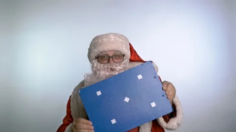 Santa Claus with a blue frame in his han... | Stock Video | Pond5