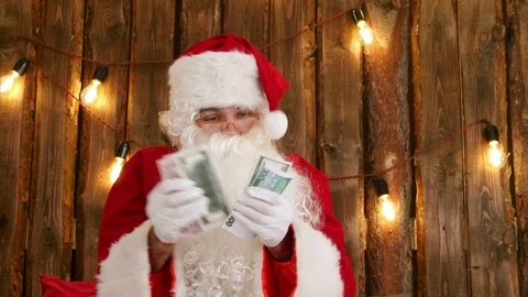 Santa Counting Money Stock Footage ~ Royalty Free Stock Videos | Pond5