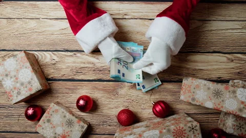 Santa Counting Money Stock Footage ~ Royalty Free Stock Videos | Pond5