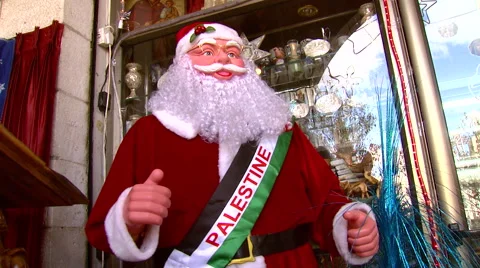 A Santa Claus with the flag of Palestine... | Stock Video | Pond5