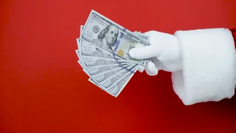 Santa Claus hand throw money into the ai... | Stock Video | Pond5
