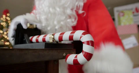 Santa Claus Pulls Candy Cane Lever | Stock Video | Pond5