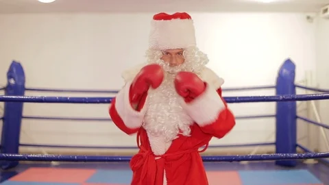 Santa Claus trains in the Boxing ring, p... | Stock Video | Pond5