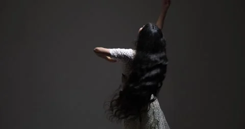Saree-Clad Indian Dancer performs on Dar... | Stock Video | Pond5