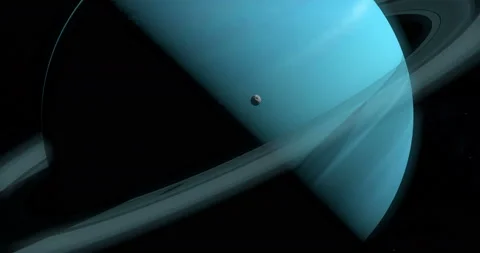 Satellite Puck, inner moon, orbiting aro... | Stock Video | Pond5