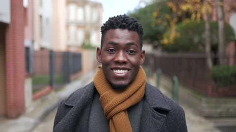 Satisfied black man walking forward smil... | Stock Video | Pond5