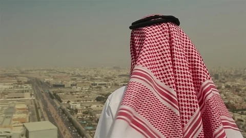 Saudi Arabian man standing on a roof in ... | Stock Video | Pond5