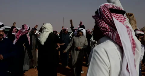 Saudi men dancing in line during Camel ... | Stock Video | Pond5