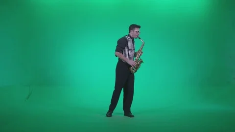 Saxophone Virtuoso Performer - 4K Green ... | Stock Video | Pond5